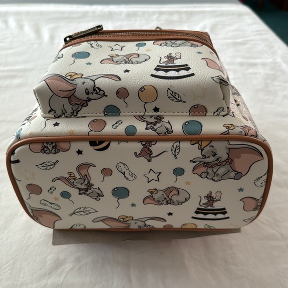 Loungefly | Bags | Loungefly Disney Dumbo Vintage Mini Backpack | Poshmark